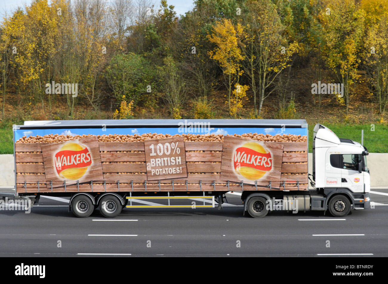 Side view Walkers potatoes snack food crisp making business advertising ...