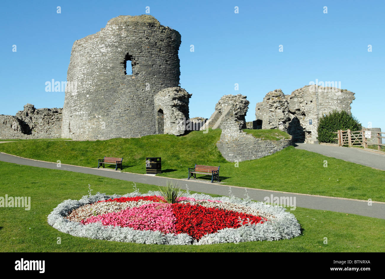 Aberystwyth castle ruins and colourful flower bed, Wales UK Stock Photo ...