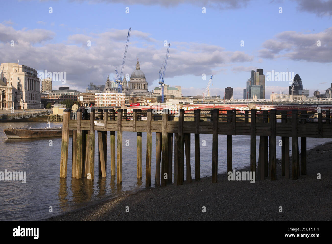London skyline and pier over the Thames Stock Photo - Alamy