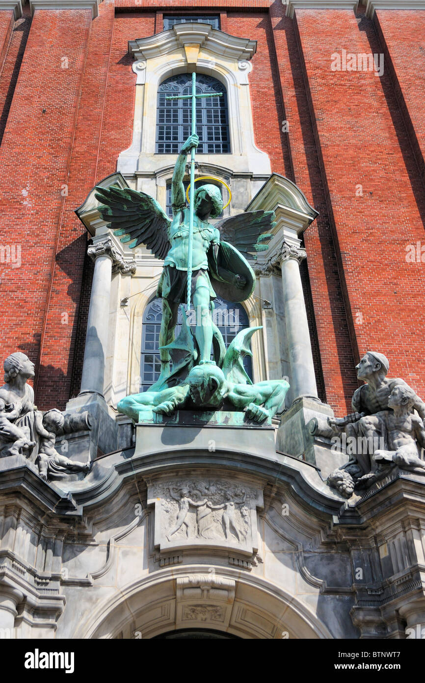 Sculptures show St. Michael's Victory over the Devil above the main ...