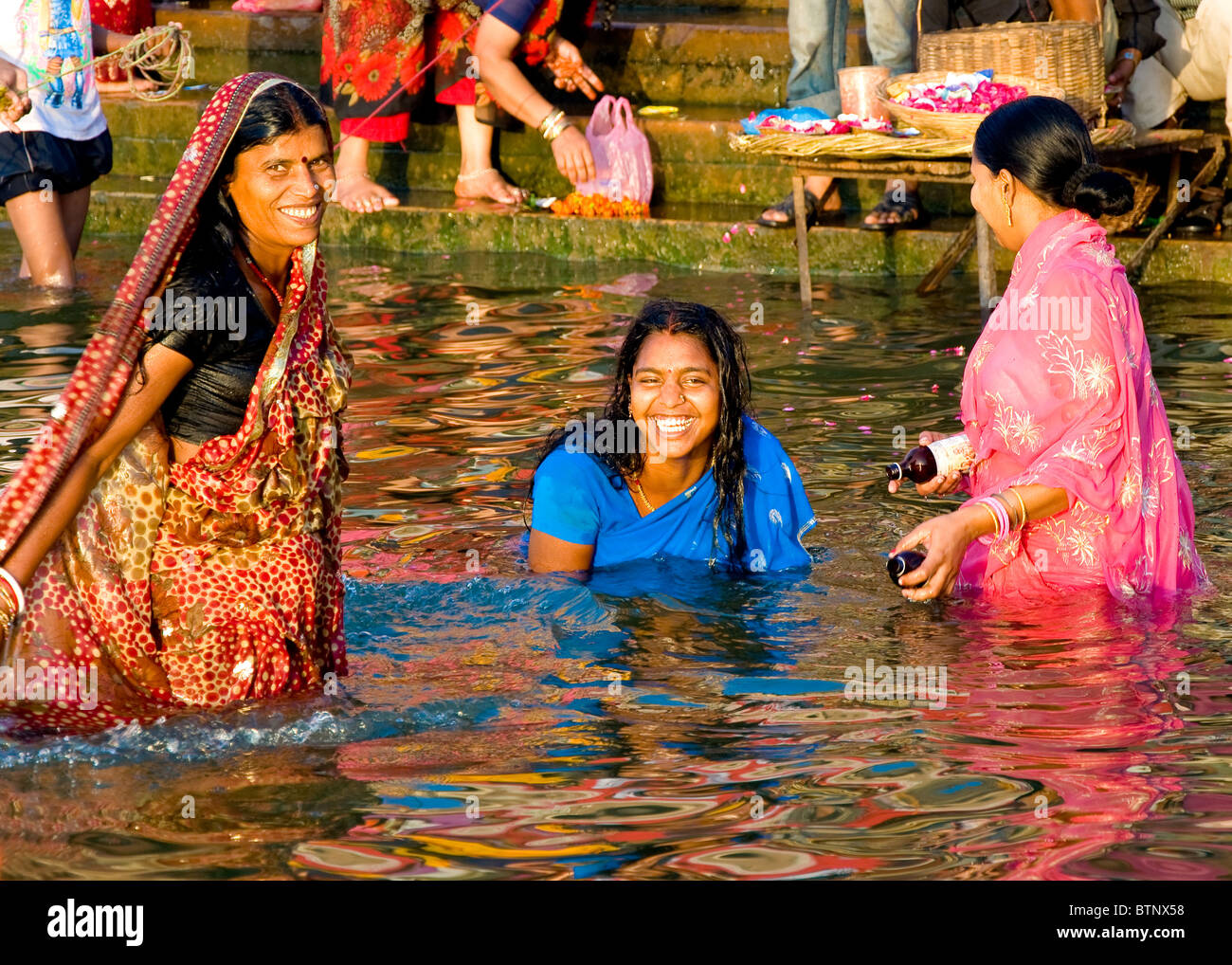 Women bathing, Ghats, Varanasi, Uttar Pradesh, India Stock Photo ...