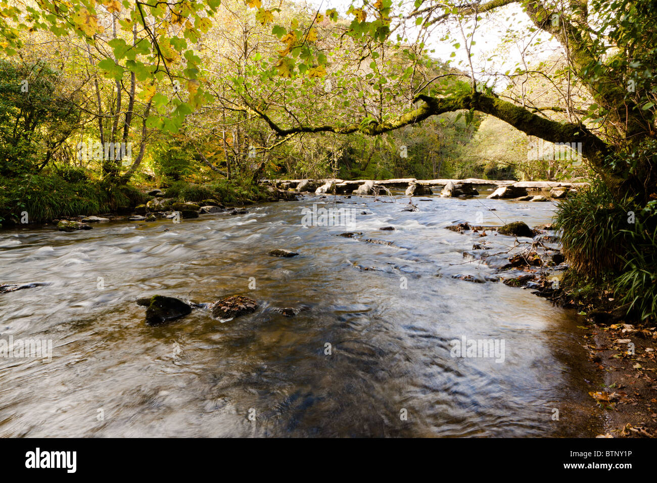 Tarr steps in an ancient clapper bridge that crosses the the River ...