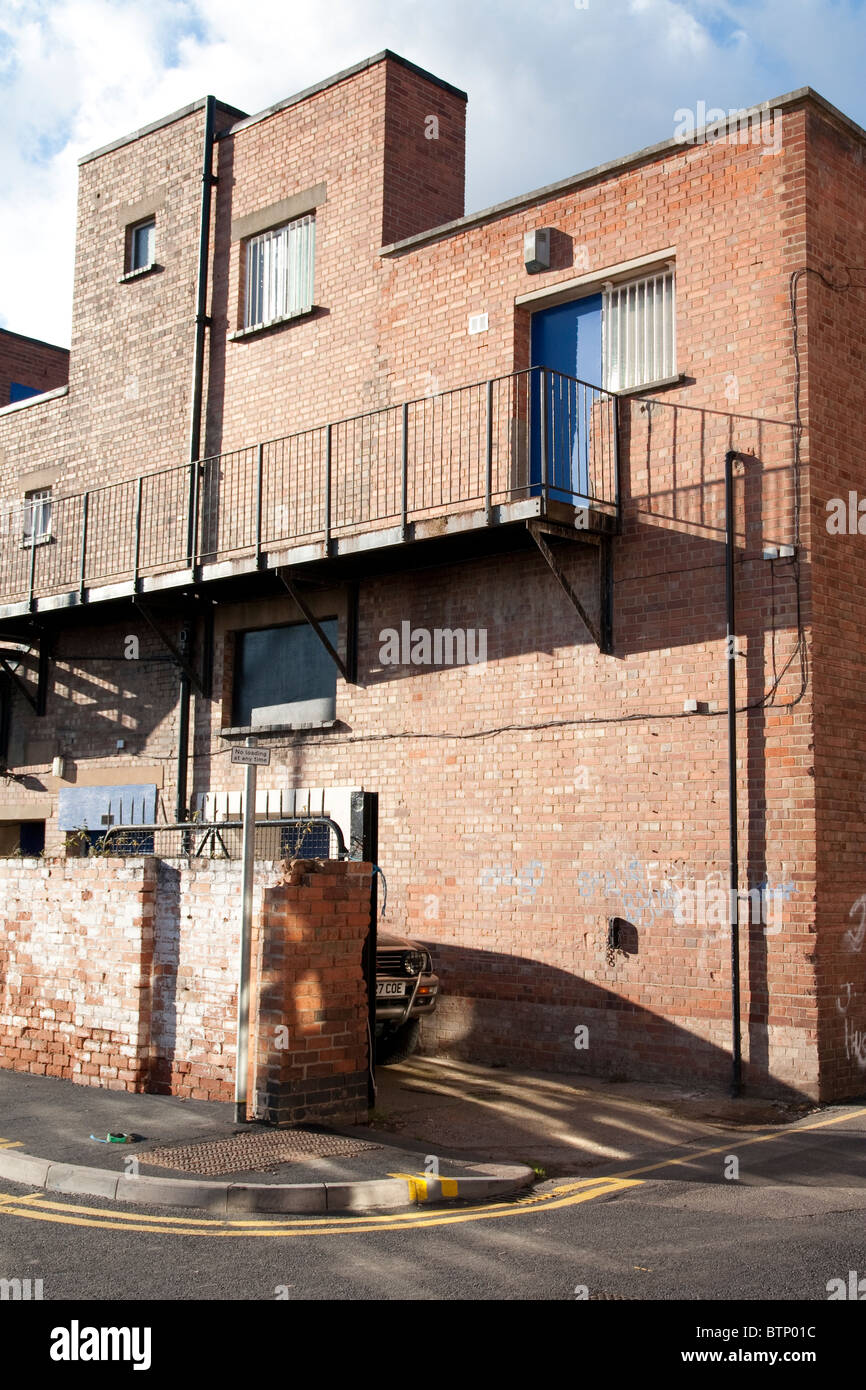 The rear of a brick building showing the fire escape exit, Nottingham ...