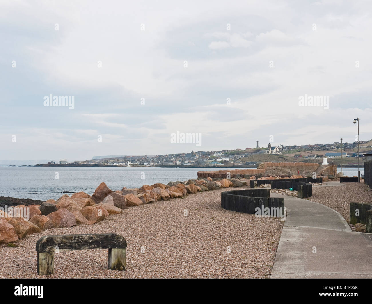 Waterfront walk near the harbour with Macduff seen across the water ...