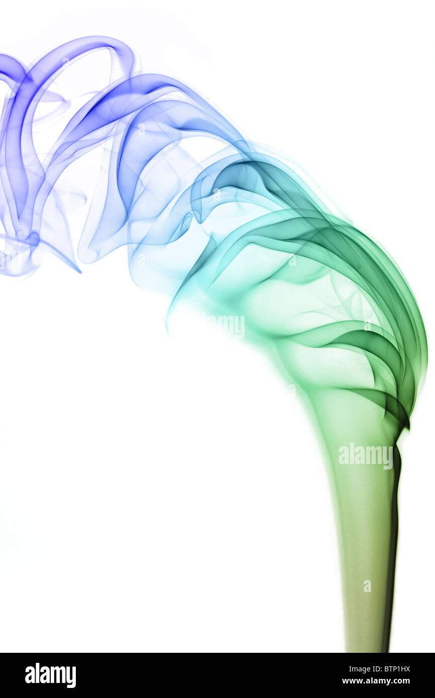 Colored smoke rising on a white background Stock Photo - Alamy