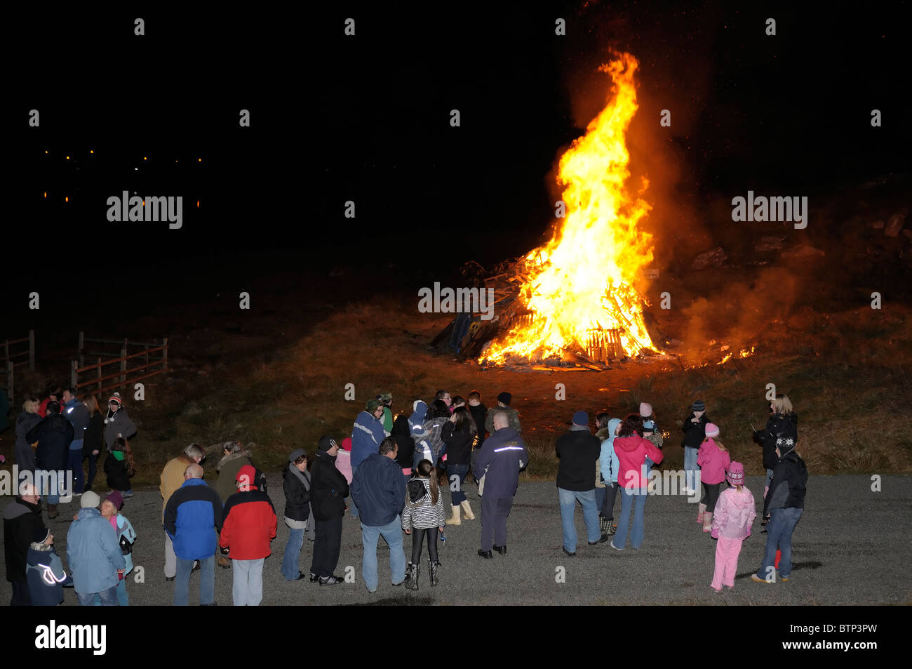 people at a local bonfire Stock Photo - Alamy