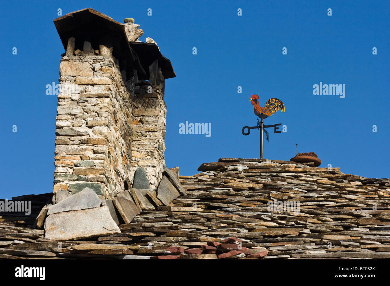 A detail from the slate-roof with weather-cock, Balkans, Bulgaria Stock ...