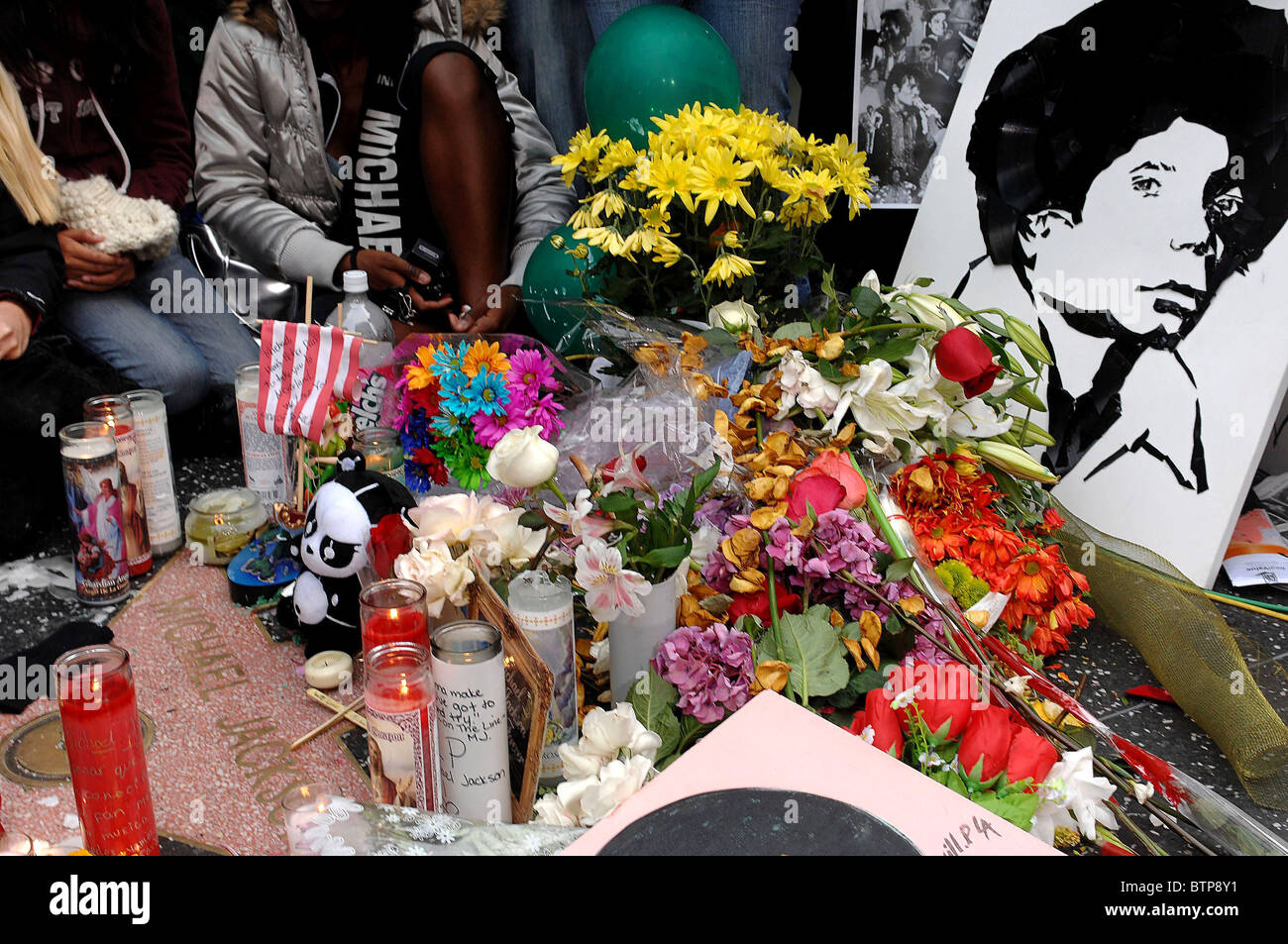 Fans Leave Flowers on Michael Jackson's Star on the Hollywood Walk of ...