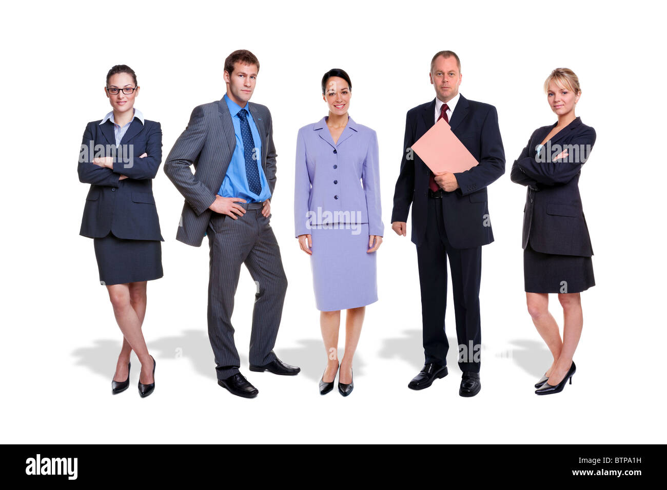 Photo of a five person business team isolated on a white background ...