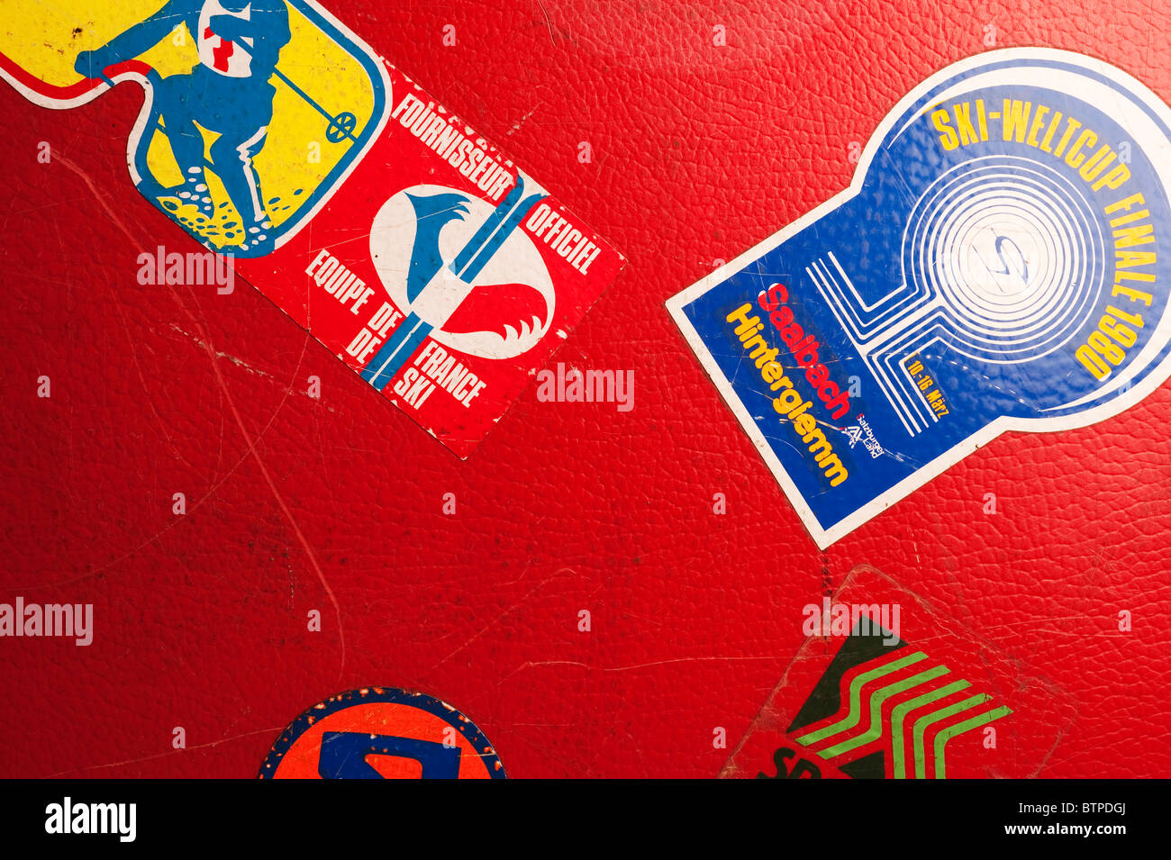 Red suitcase and stickers hi-res stock photography and images - Alamy