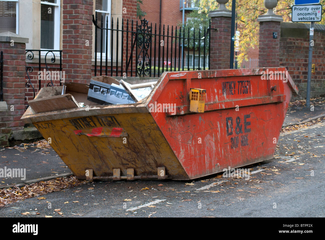 Rubbish Waste Skip in a Street, UK Stock Photo - Alamy