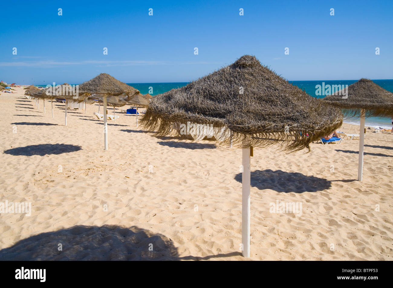Faro Beach, Umbrellas, Algarve, Portugal Stock Photo - Alamy