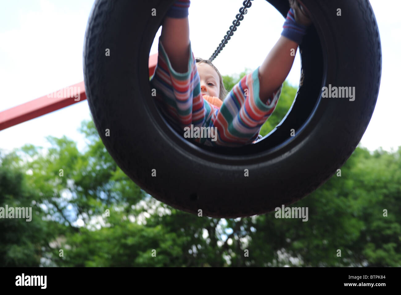 Child push swing hi-res stock photography and images - Alamy