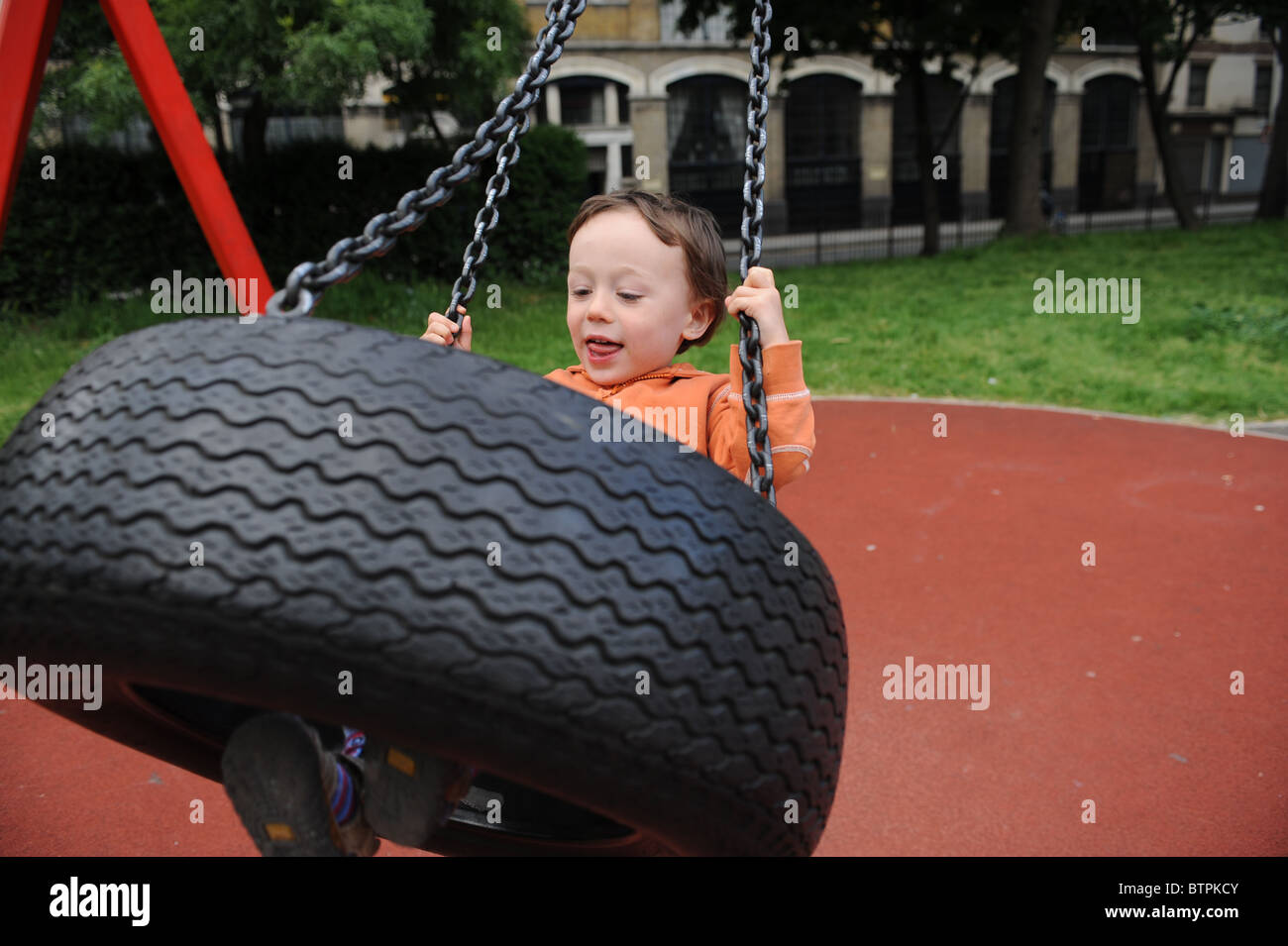 Child push swing hi-res stock photography and images - Alamy