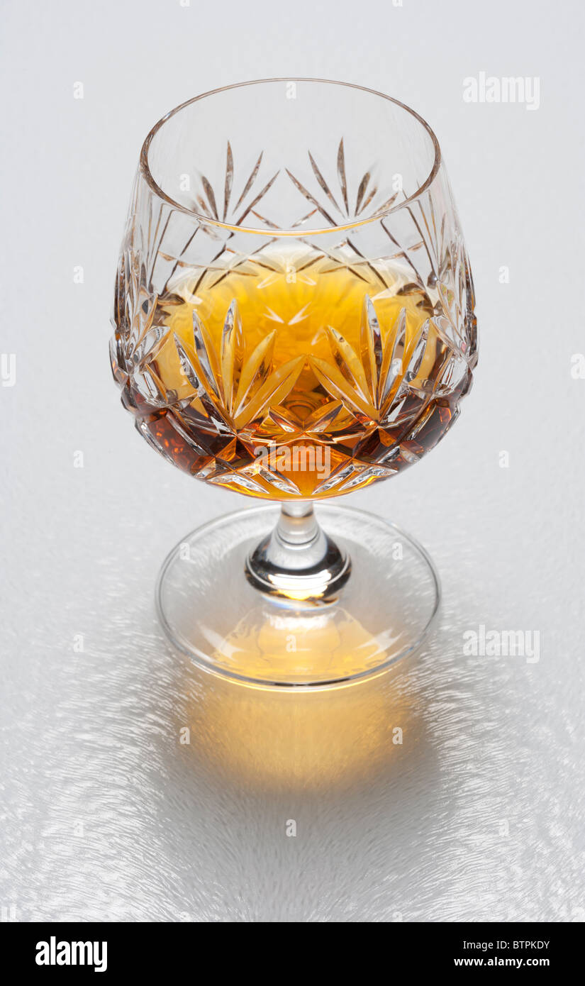 Brandy in crystal glass Stock Photo - Alamy