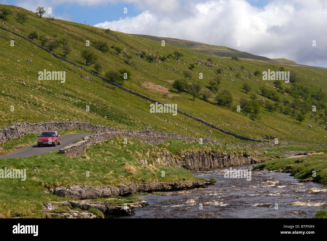 England, North Yorkshire, Langstrothdale, Oughtershaw, Car on road ...