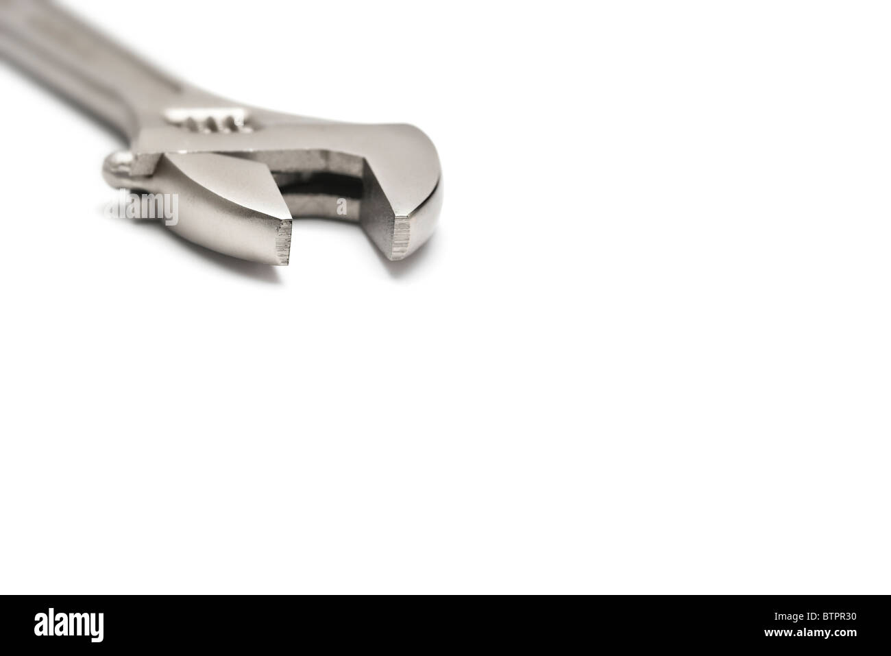 Wrench isolated in a white background Stock Photo - Alamy