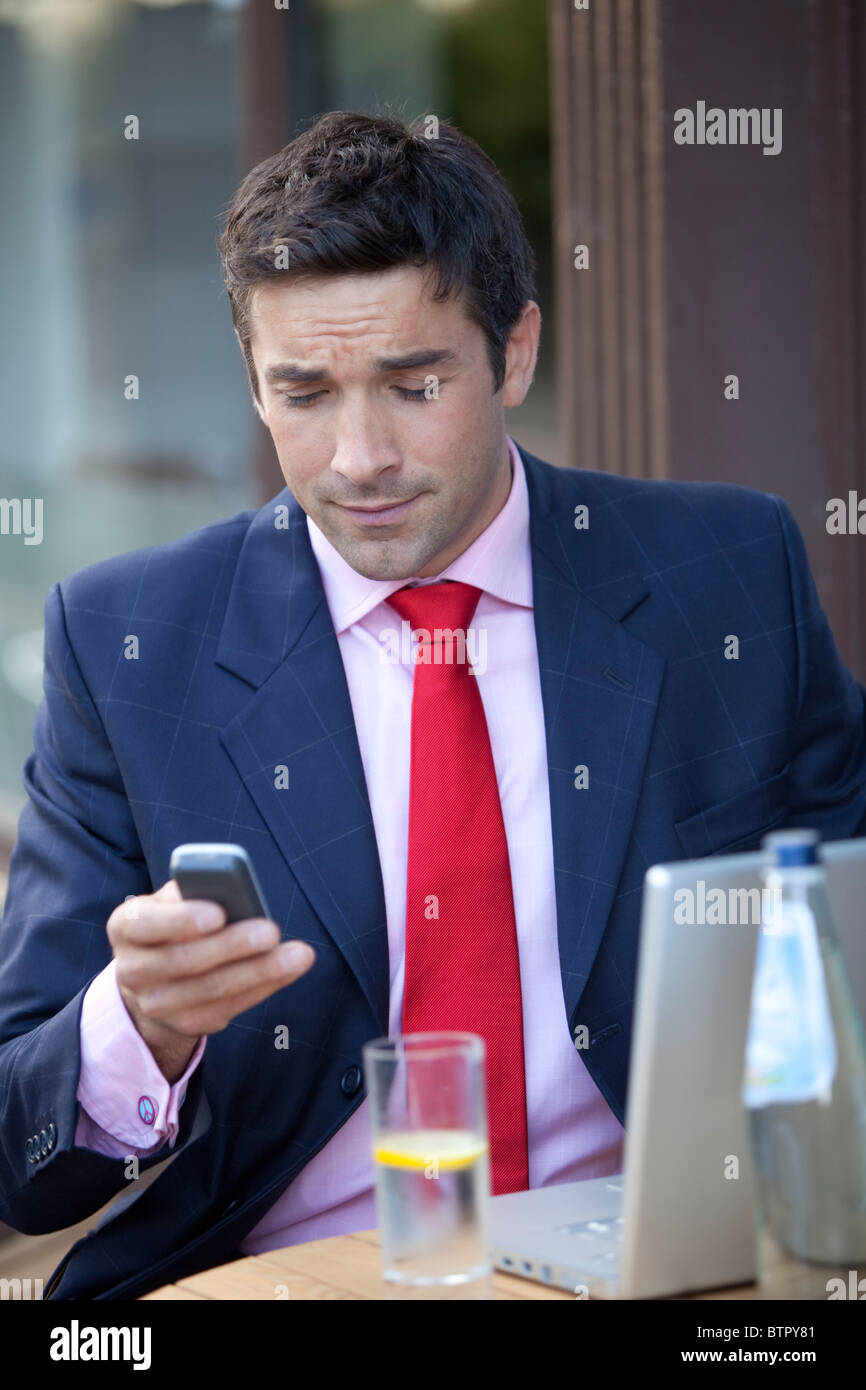 man in a smart suit at laptop Stock Photo - Alamy