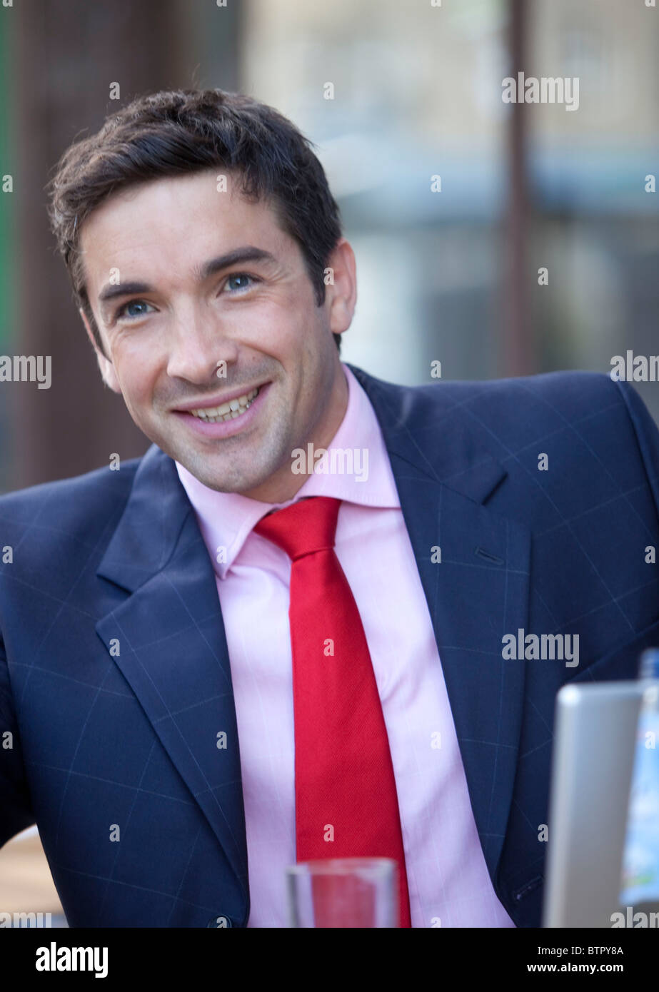 man in a smart suit at laptop Stock Photo - Alamy