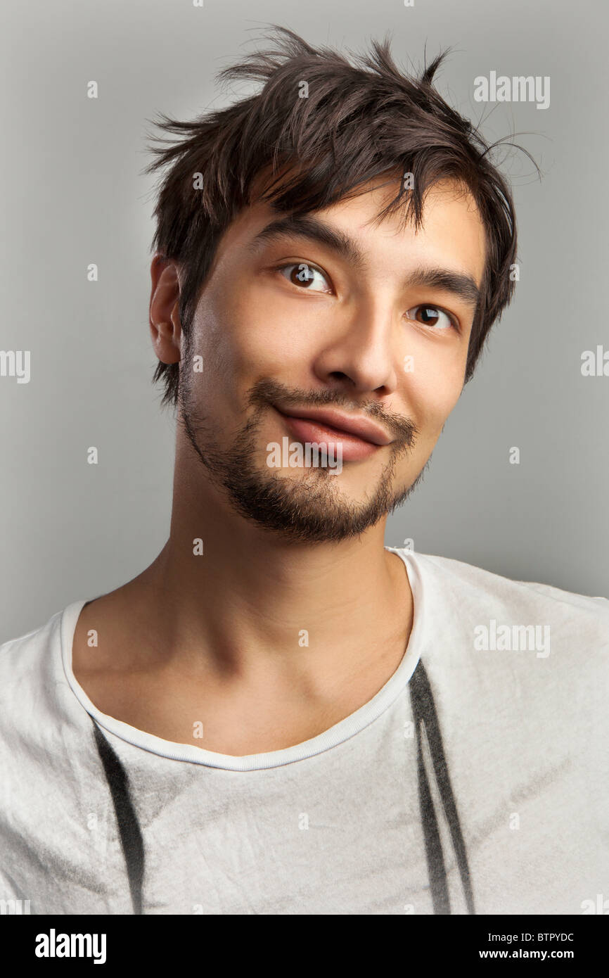A studio portrait of a young man Stock Photo - Alamy