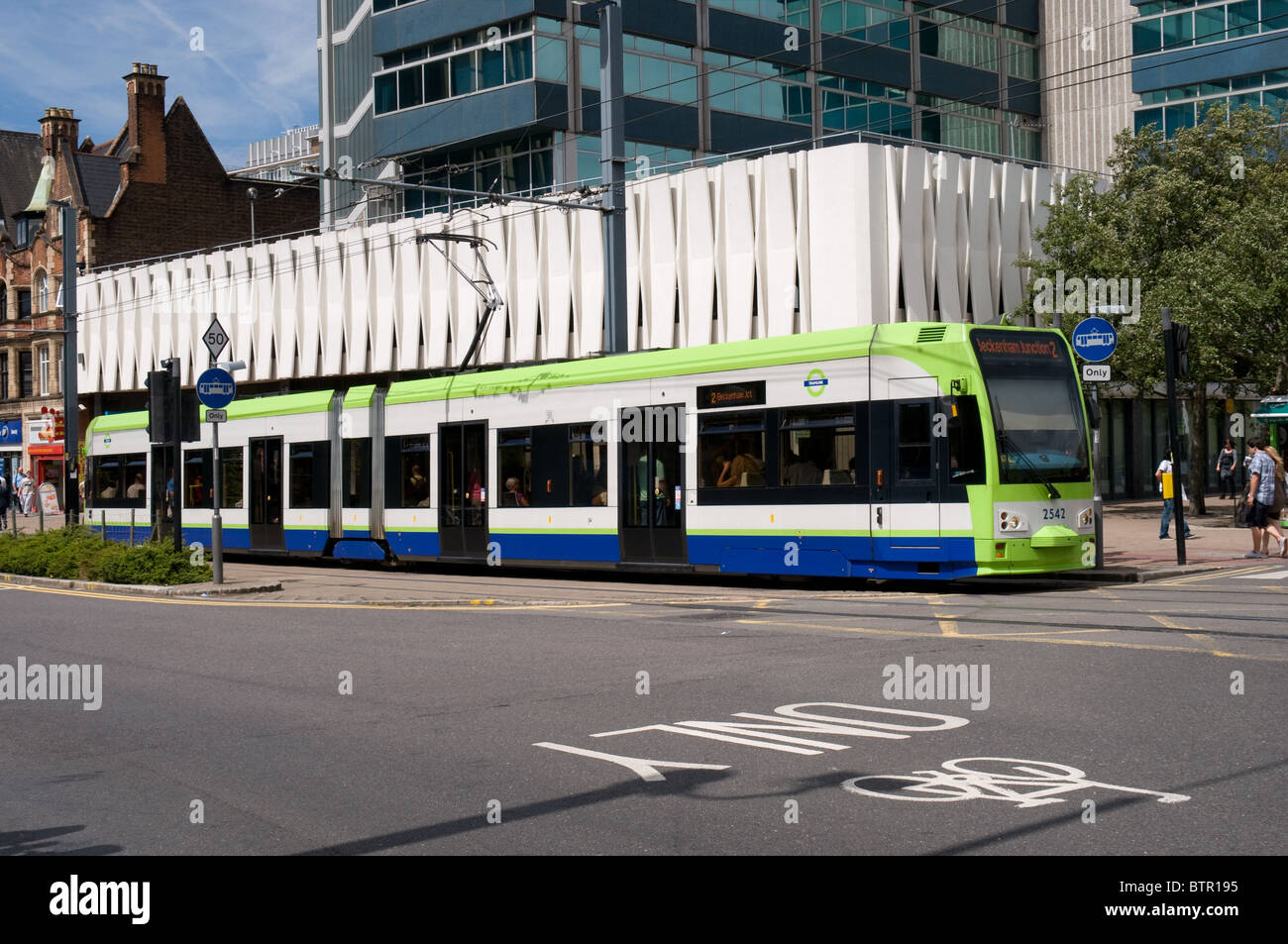 A Bombardier Eurorail CR4000 Articulated tram passes along George ...