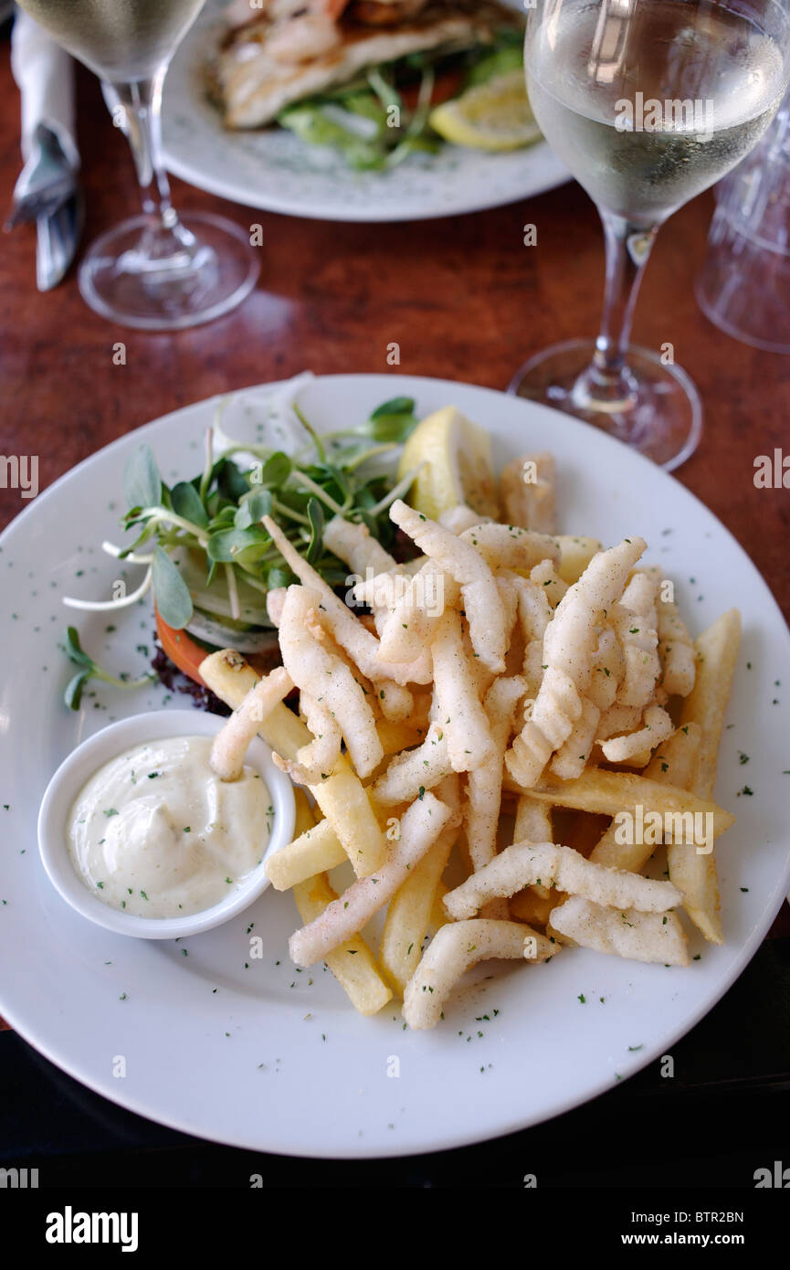 Australia, Albany, Deep fried seafood with dip and white wine Stock ...