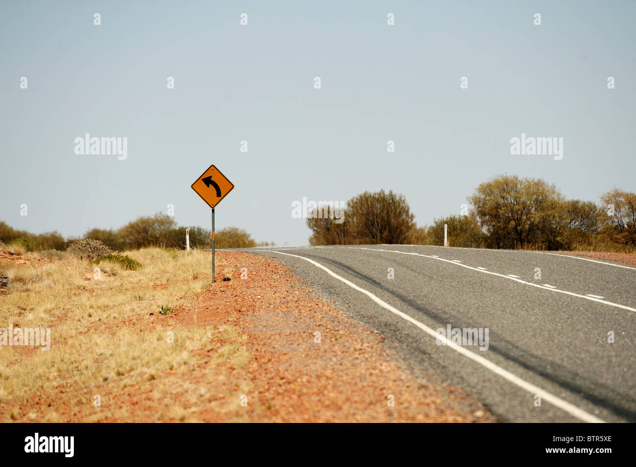 Australia, Curve road sign Stock Photo - Alamy