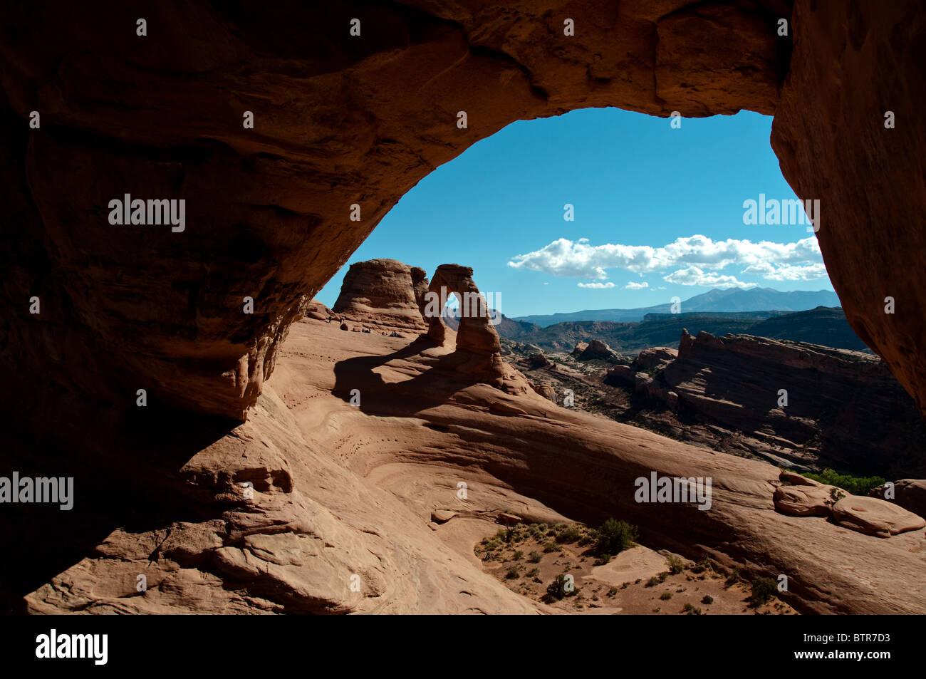 Delicate Arch through a little Arch Stock Photo - Alamy