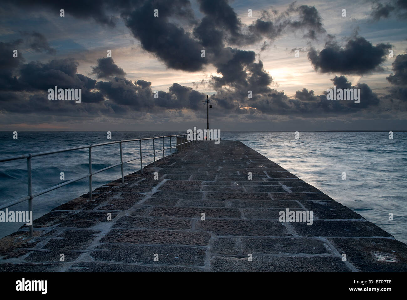 Harbor at Porth Leven, Cornwall, leading out into the Atlantic ocean ...
