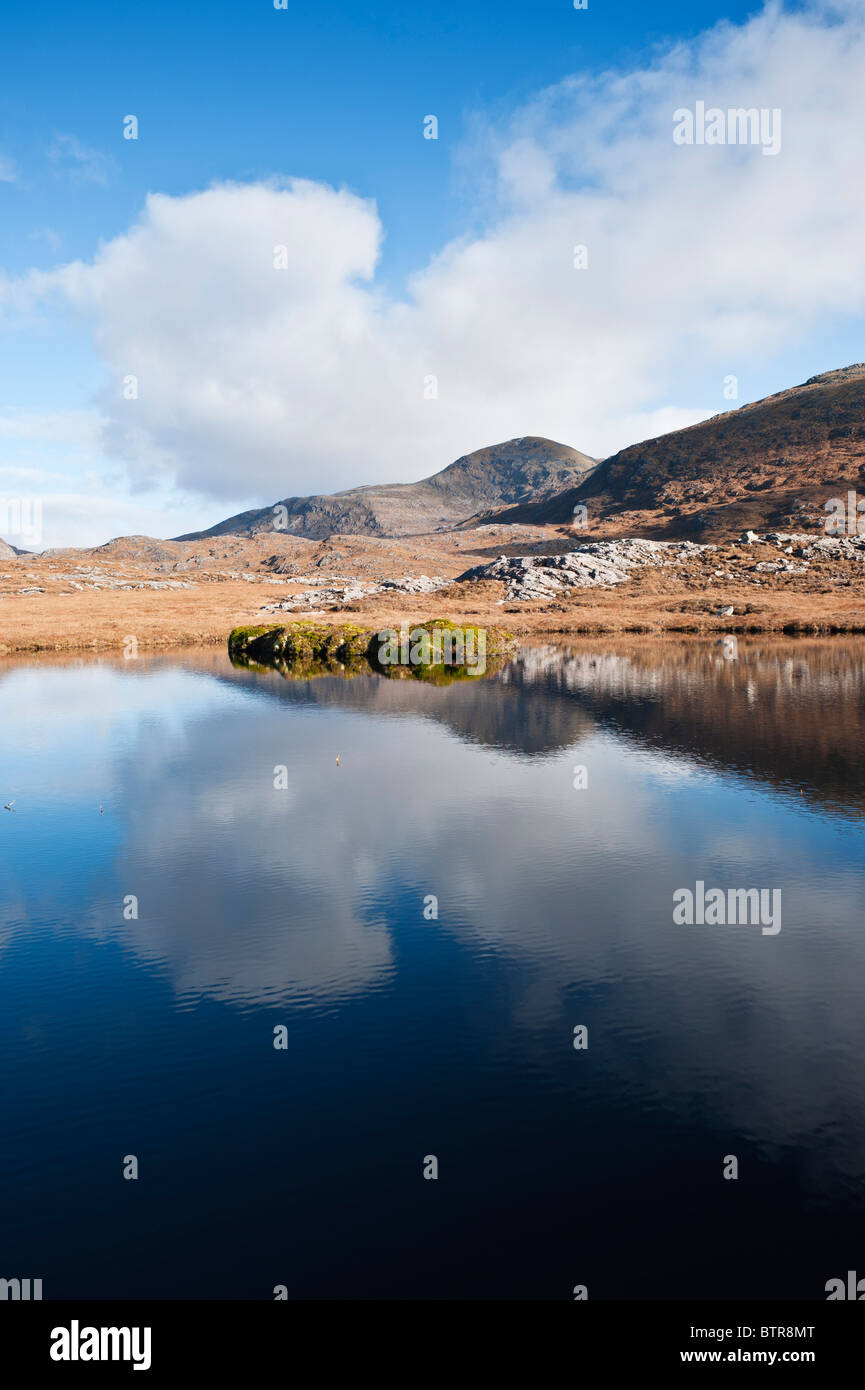 Small tarn with mountain reflection, Isle of Harris, Outer Hebrides ...