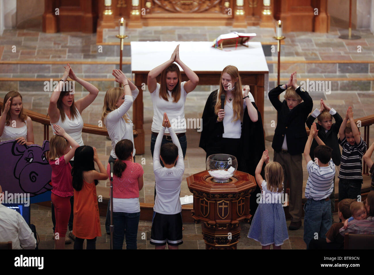 Senior high youth lead the Sunday morning worship service at Saint ...