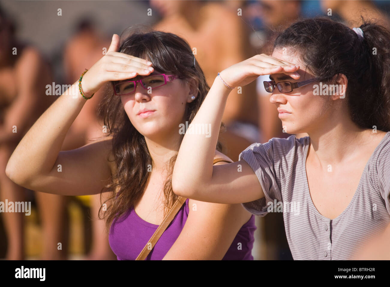 Series of shots of spectators at the World Qualifying Series Ocean and ...
