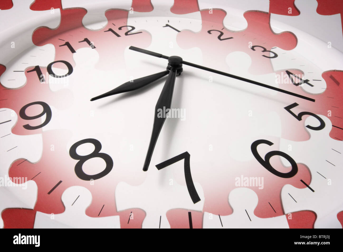 Clock and Jigsaw Puzzle Stock Photo - Alamy