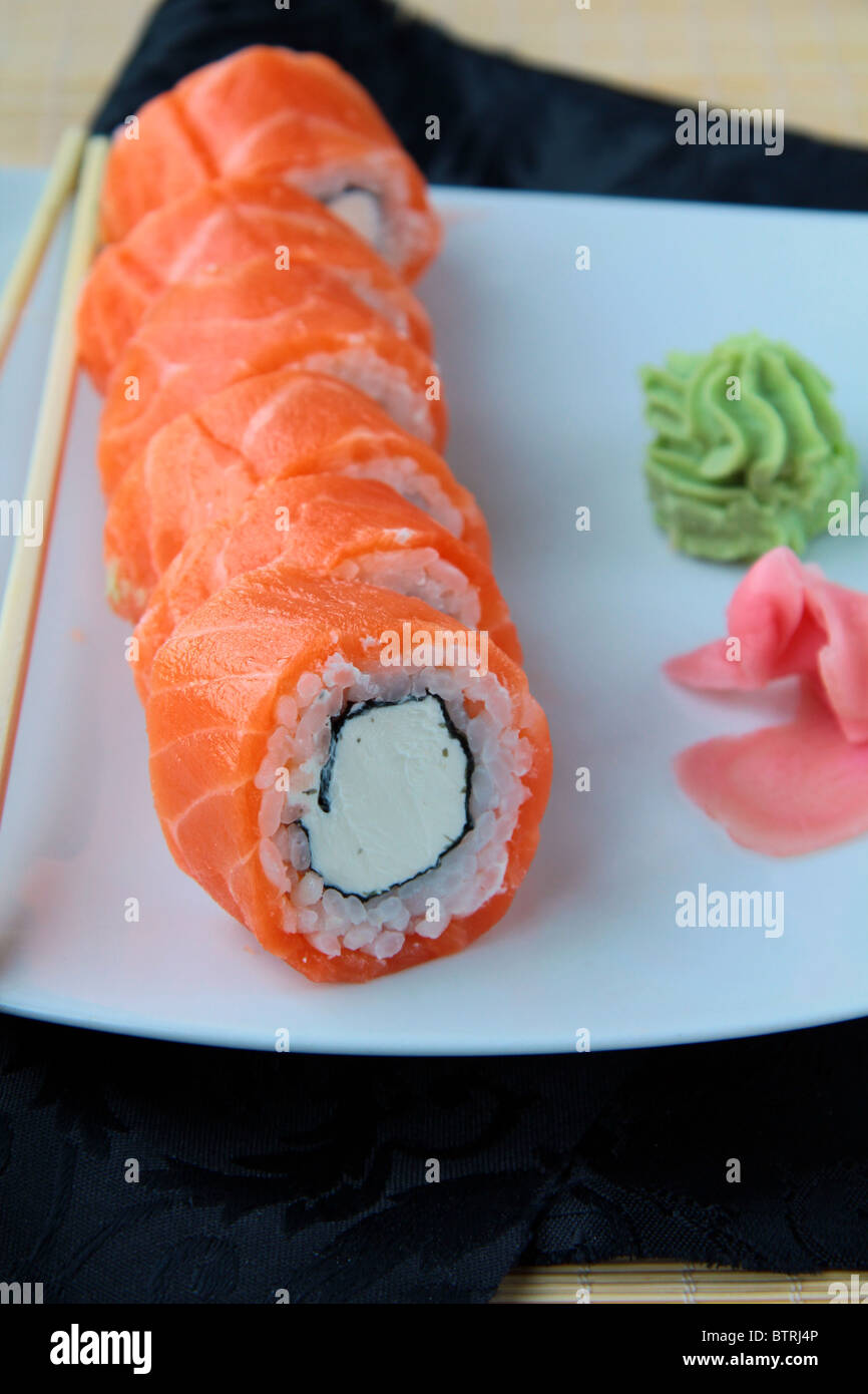 Traditional Japanese food on a square plate with chopsticks Stock Photo ...