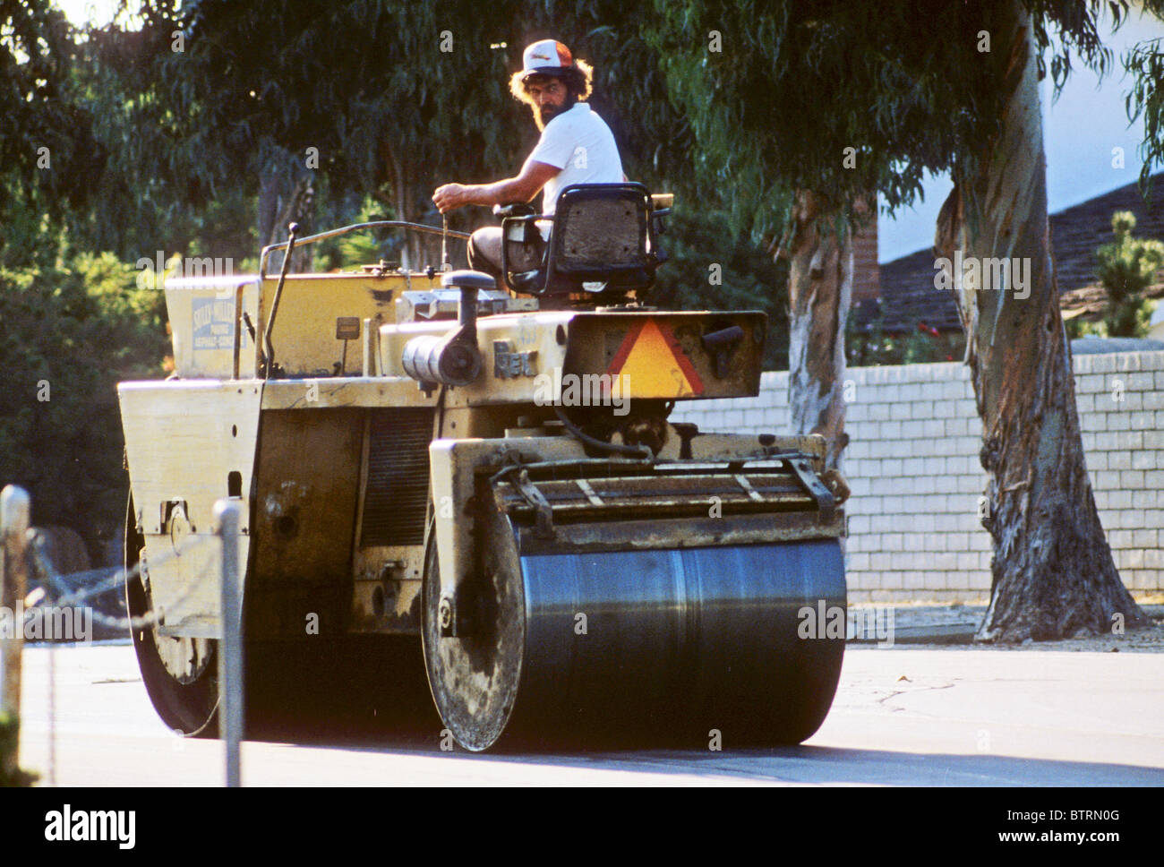 Street pavement roller weight smooth machine operate run drive press ...