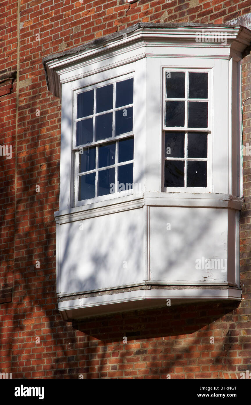 Georgian oriel window on a building bordering the grounds of Winchester ...