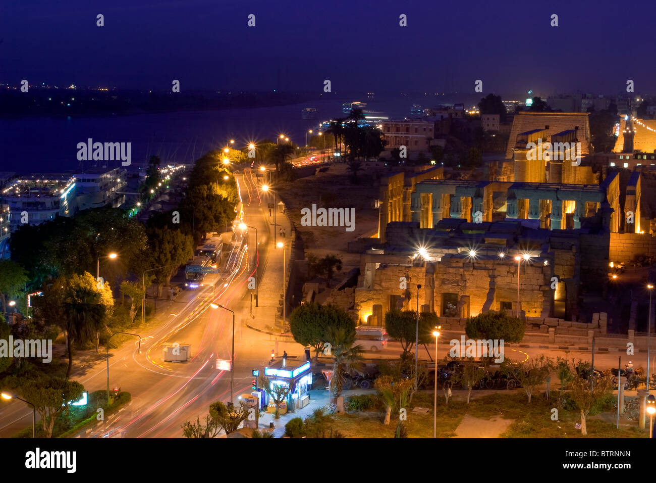 View of Luxor Temple, the Corniche el Nill and cruise boats on the ...