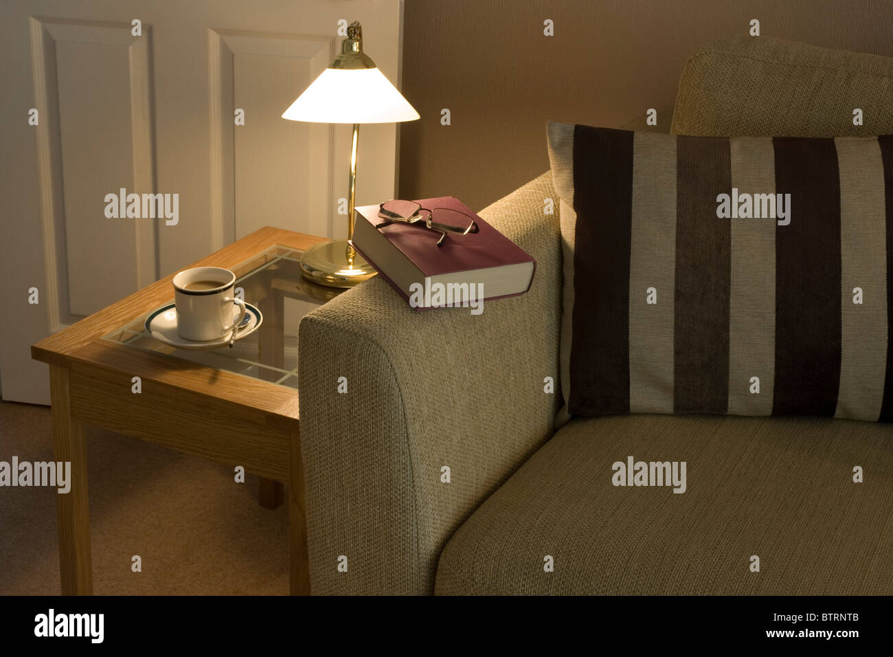 Living room book sofa Stock Photo - Alamy