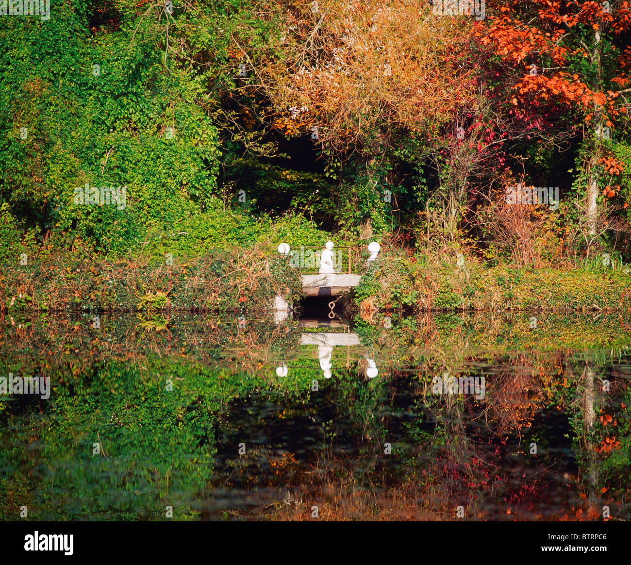 Altamont Garden, Co Carlow, Ireland; Sculptures Over Sluice By The Lake ...