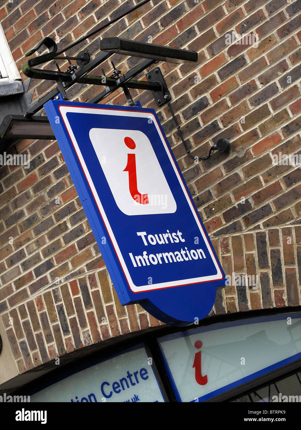 Hanging tourist information sign outside Stock Photo - Alamy