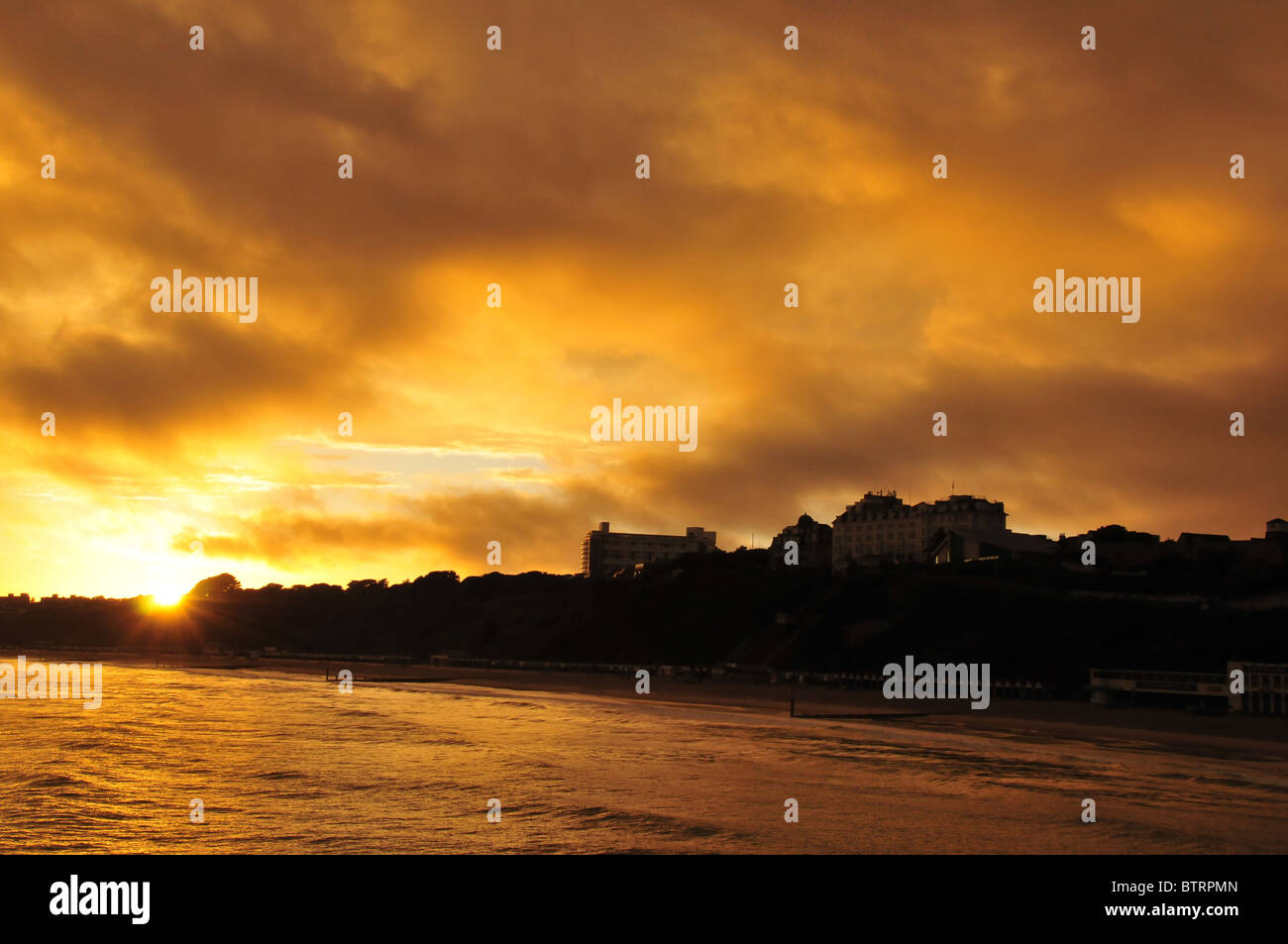 England coast buildings silhouettes water seashore dramatic sky hi-res ...