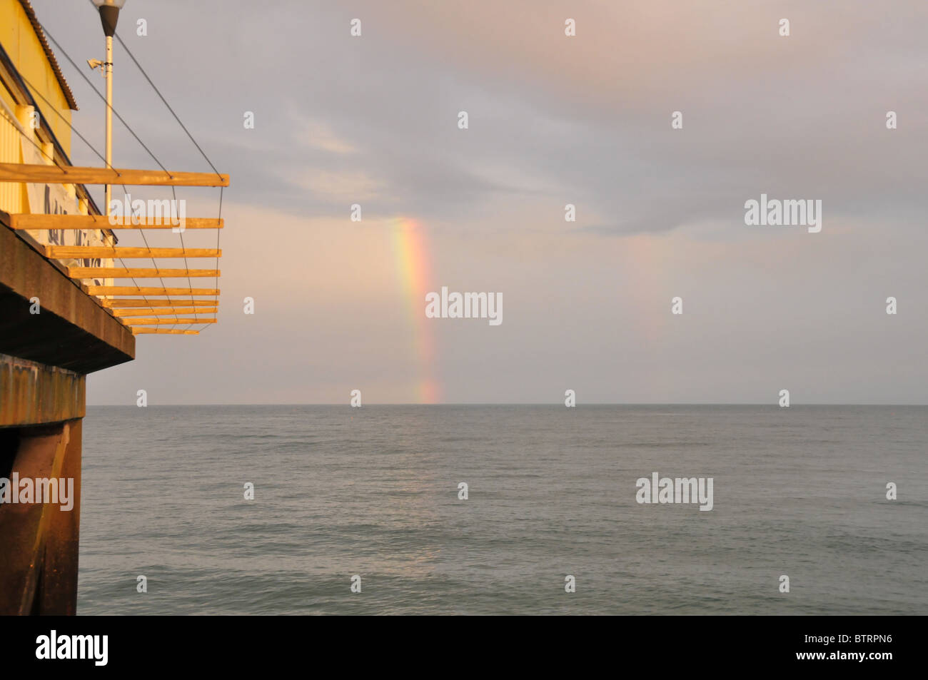 Rainbow over sea Stock Photo - Alamy