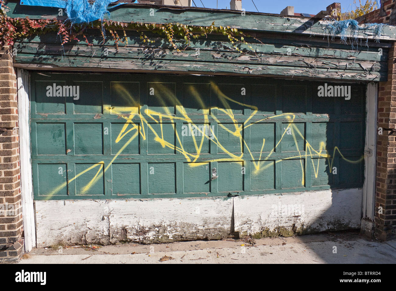 Graffiti on the old style garage Stock Photo - Alamy