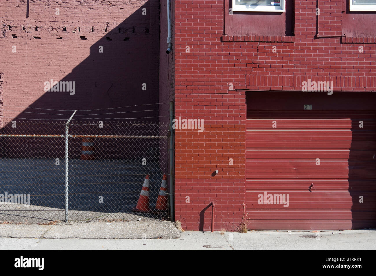 Fenced parking lot Stock Photo - Alamy