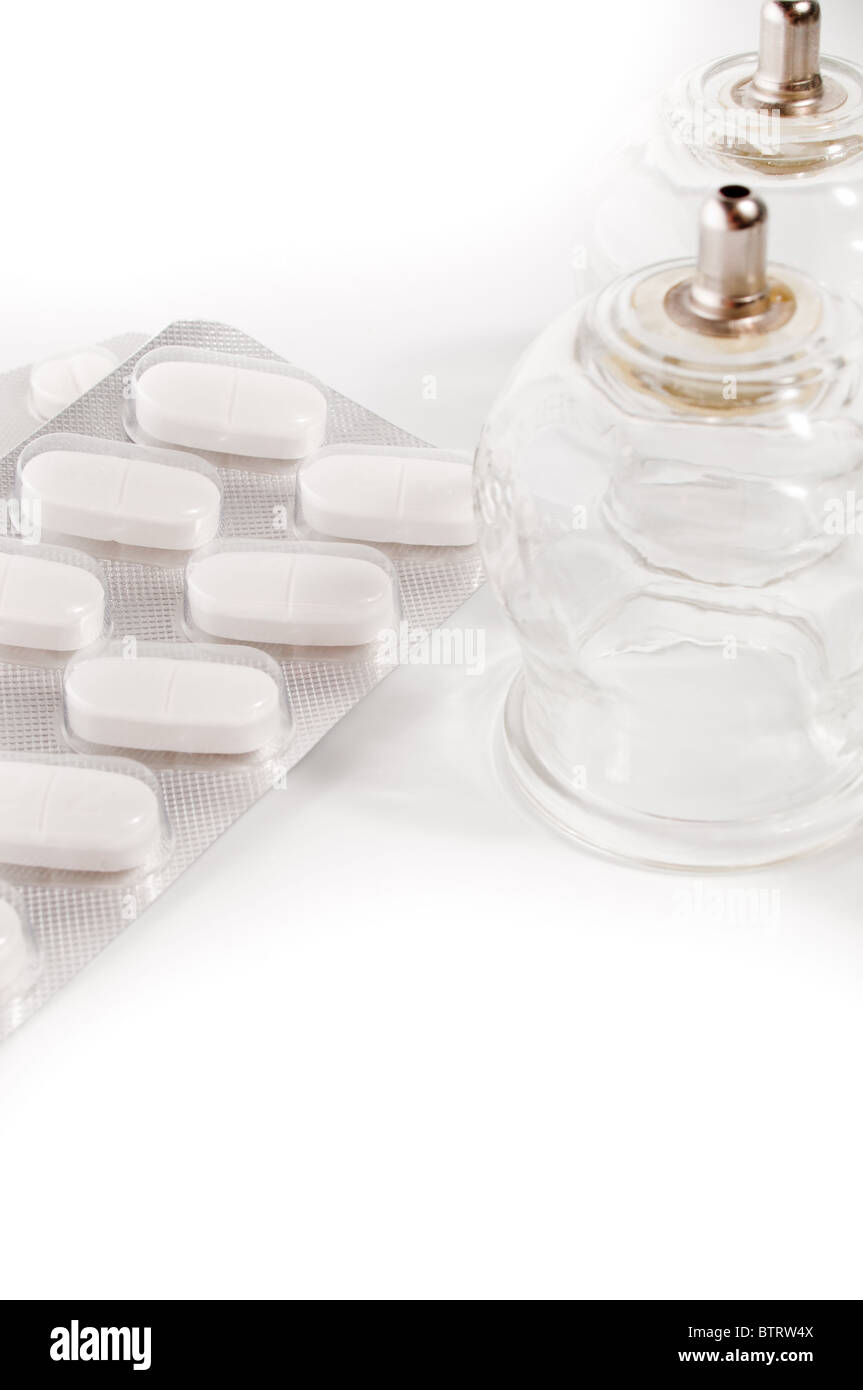 cupping rubber and tablets Stock Photo - Alamy