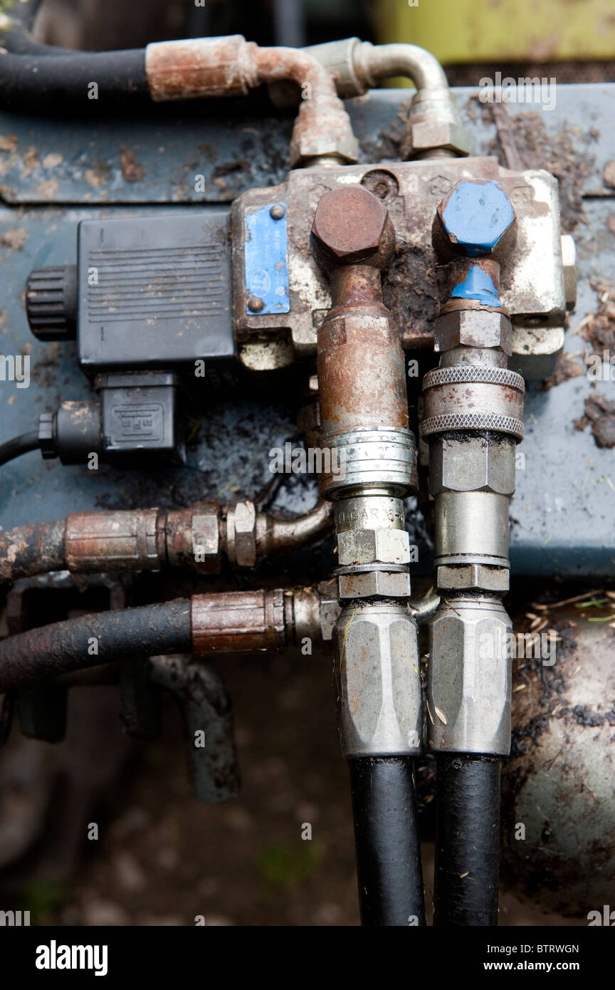 Hydraulic connections on a farm tractor Stock Photo - Alamy