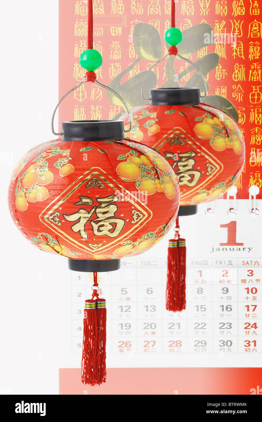 Chinese prosperity lanterns and new year calendar Stock Photo - Alamy