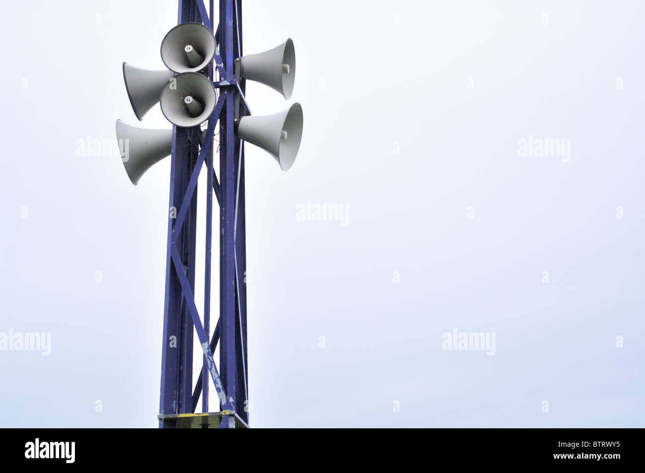 Stack of six megaphones on a pole Stock Photo - Alamy