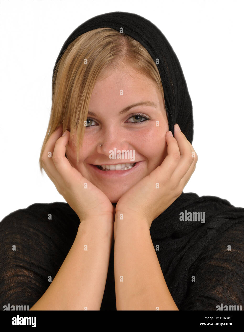 Smiling model wearing a black scarf Stock Photo - Alamy