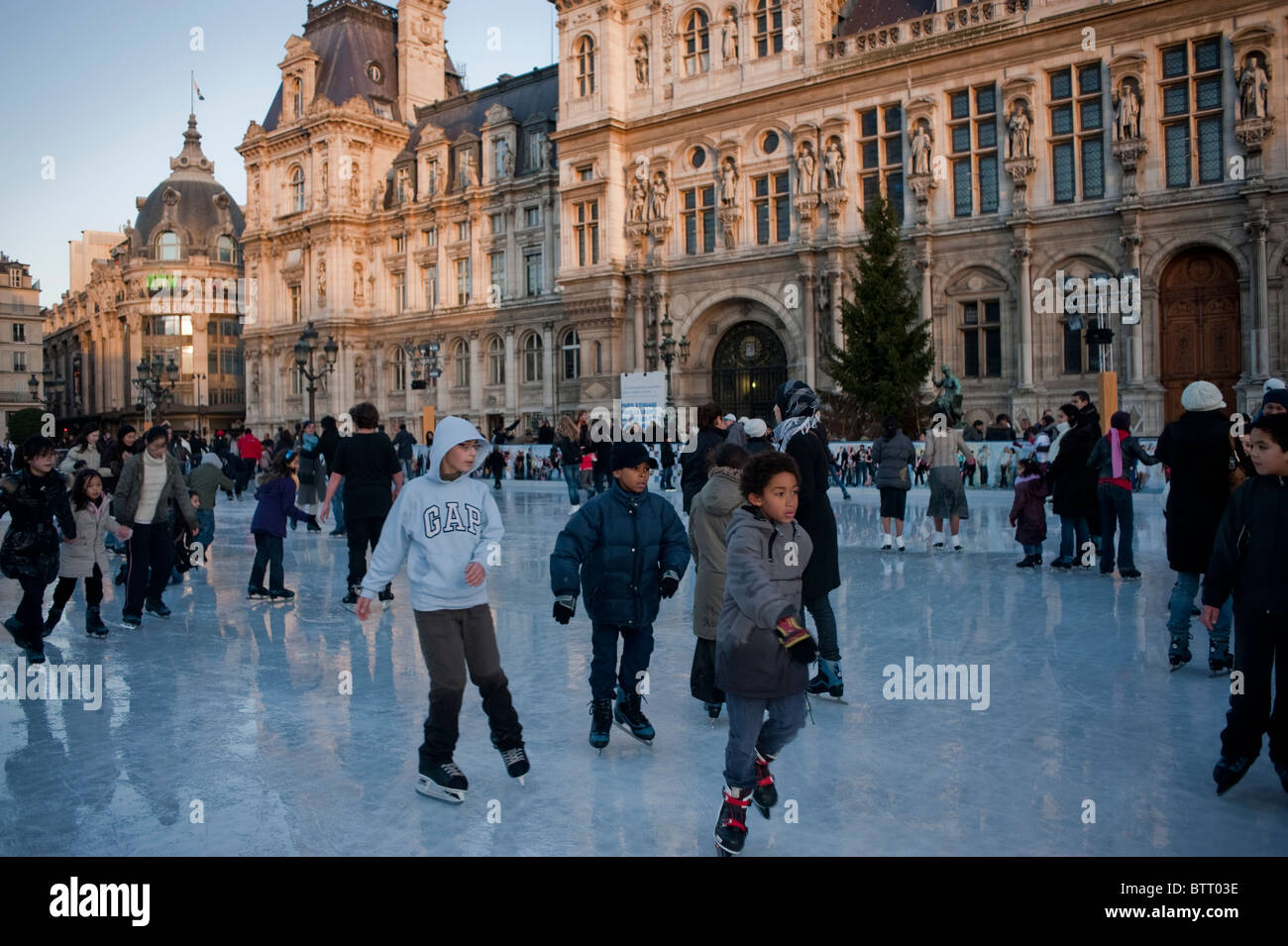 Large Crowd People, Teenagers Ice Skaters on Public Ice Skating Rink at ...